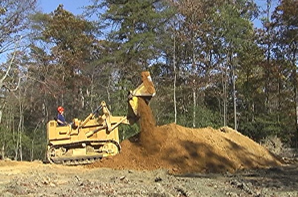 Pushing over Trees VS Digging out Stumps! - IH Construction Equipment ...