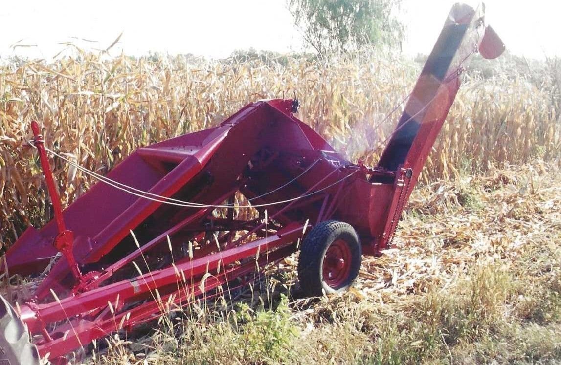 From a shucking glove to pick corn to a 1 row corn picker in the mid 90 ...